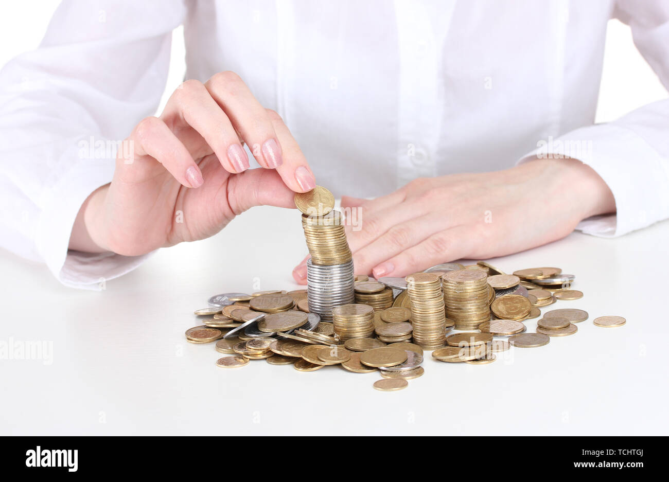 Woman hands with coins close up Stock Photo - Alamy