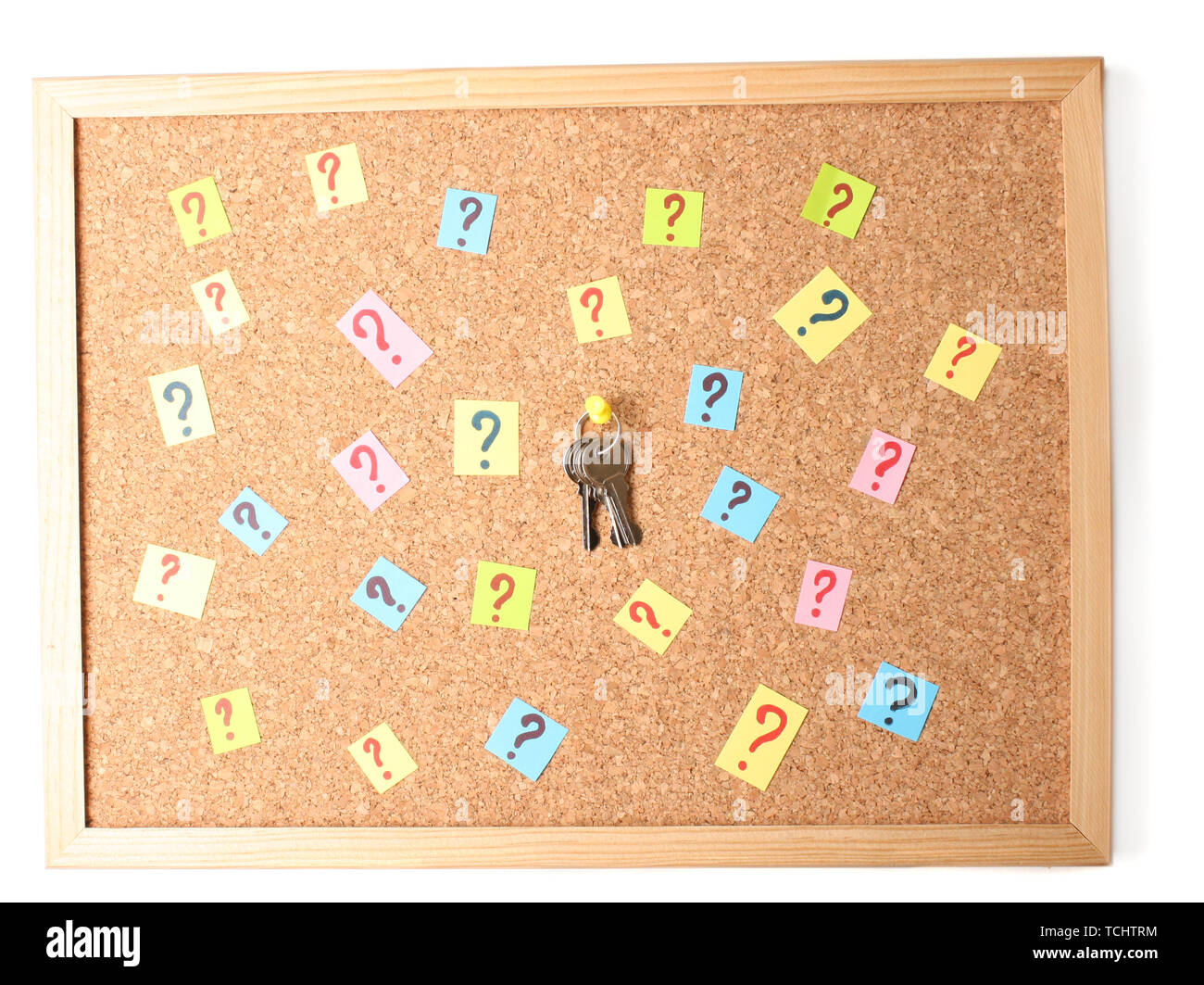 Keys with many question marks on cork board Stock Photo - Alamy