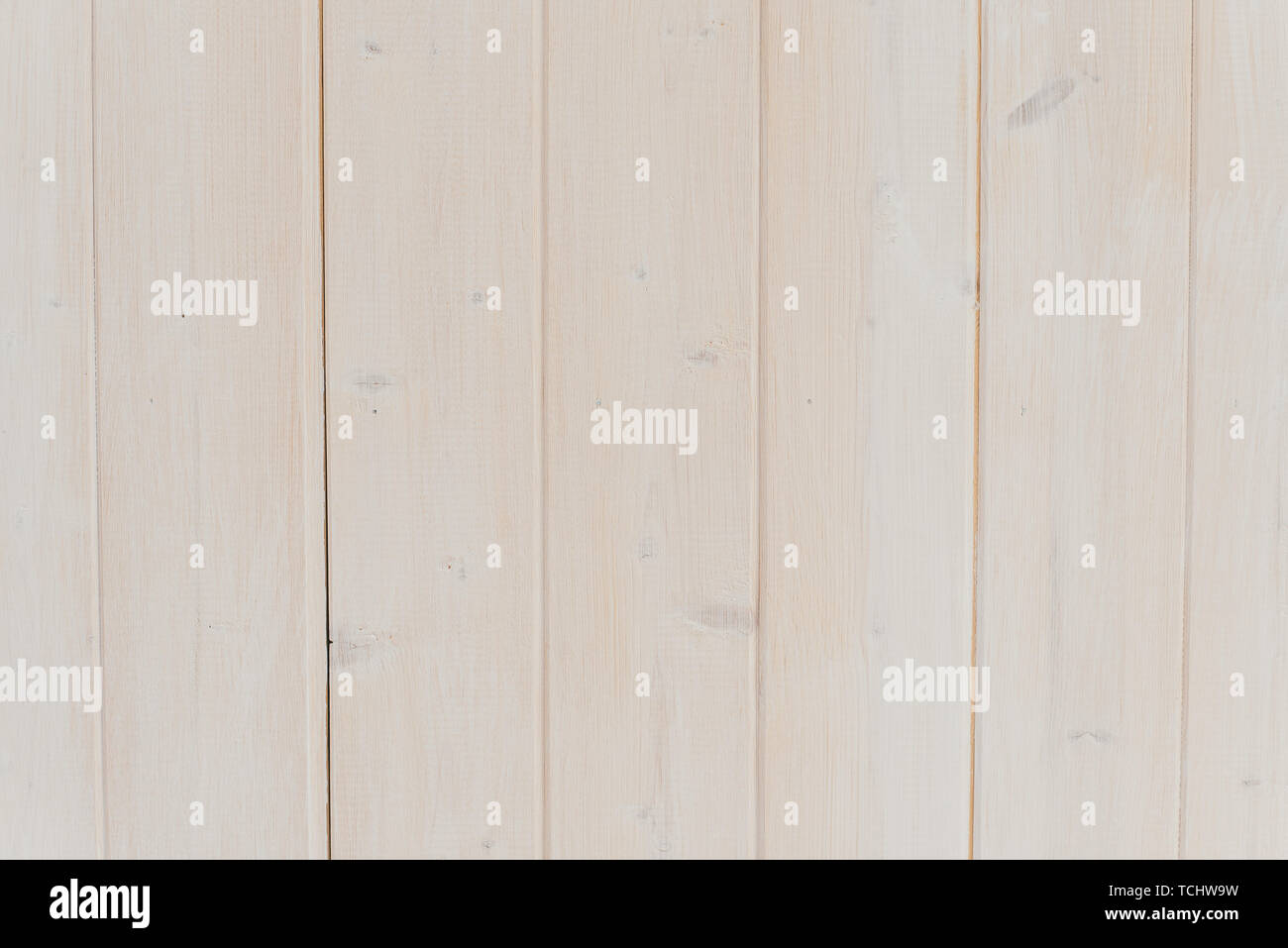 horizontal photo of vertical wooden boards. light beige wooden ...