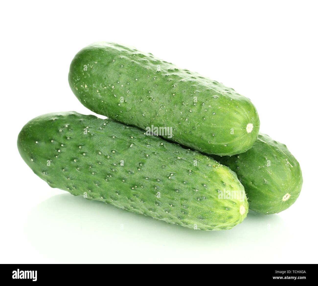 Fresh cucumbers isolated on white Stock Photo - Alamy