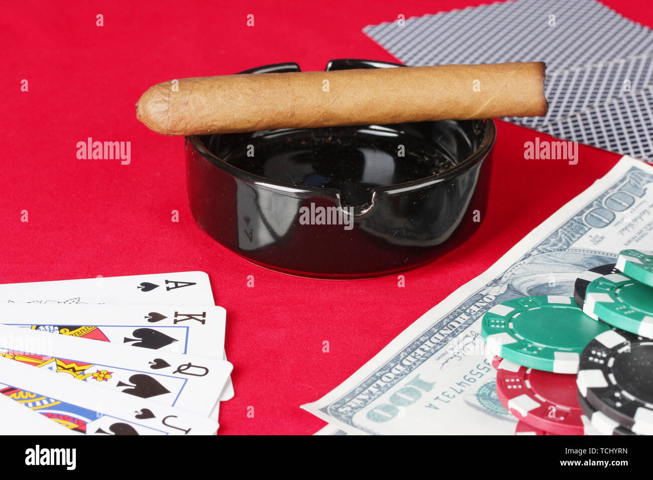 he red poker table with a combination of royal flush Stock Photo - Alamy