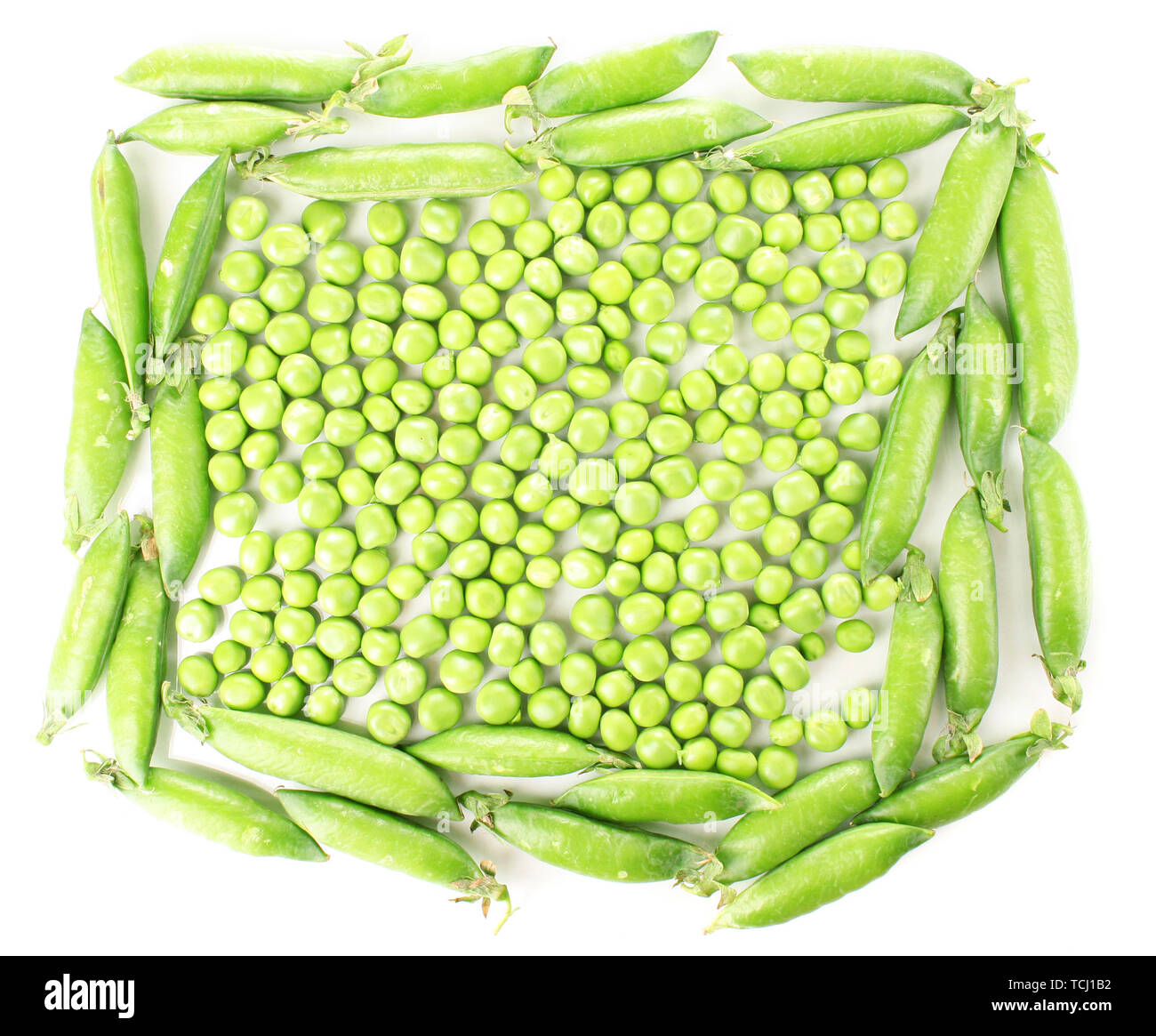 Green peas isolated on white Stock Photo - Alamy