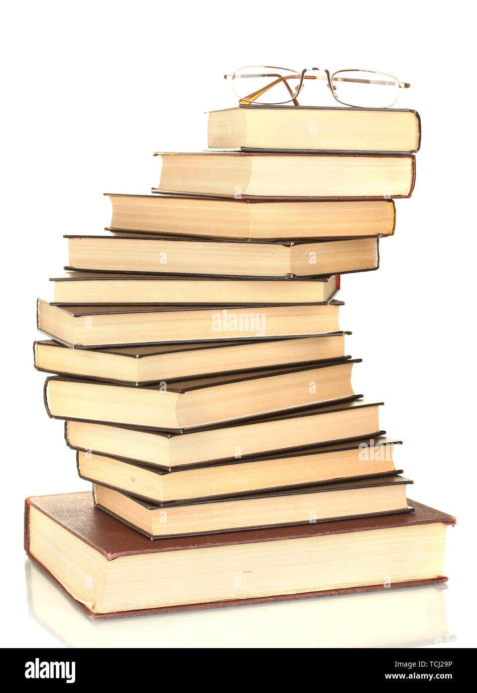 tower of books with glasses isolated on white background Stock Photo ...