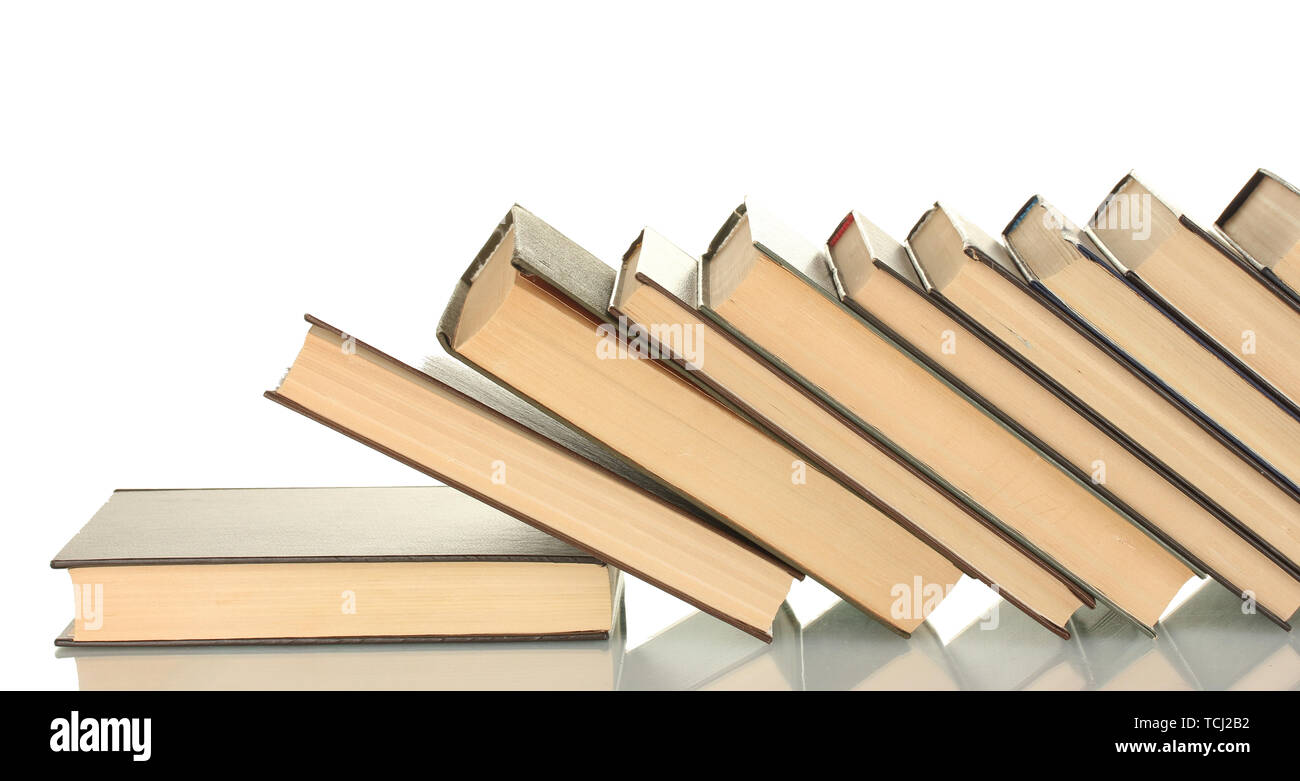 leaning stack of books on white background Stock Photo - Alamy