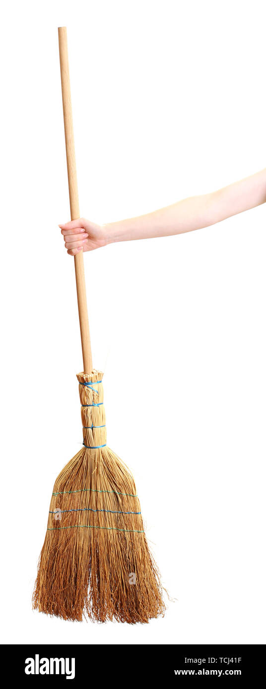 Broom in hand isolated on white Stock Photo - Alamy