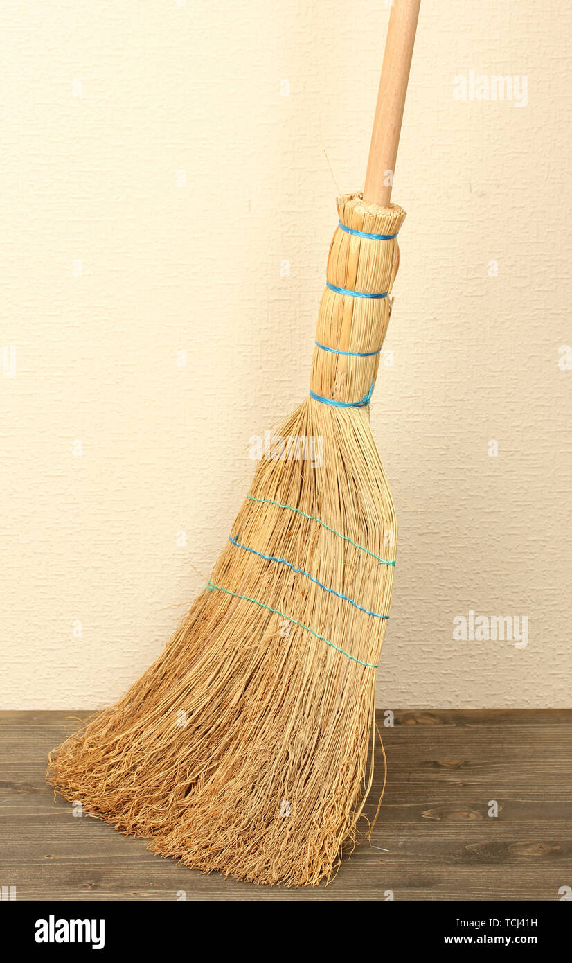 Broom on floor in room Stock Photo - Alamy