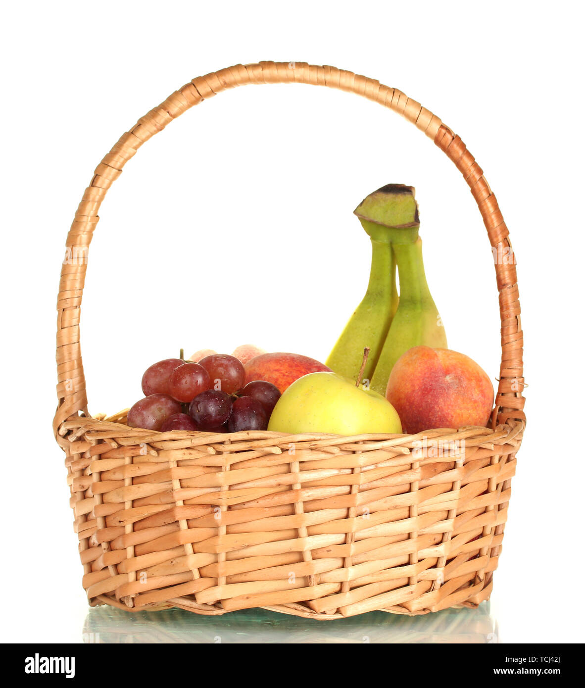 Ripe fruits in basket isolated on white Stock Photo - Alamy