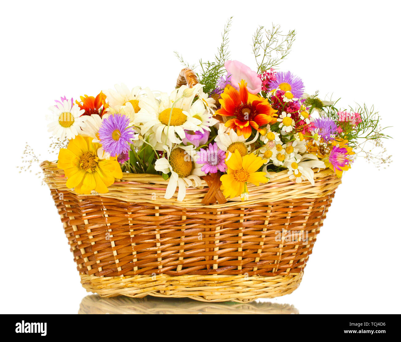 beautiful bouquet of bright wildflowers in basket, isolated on white ...