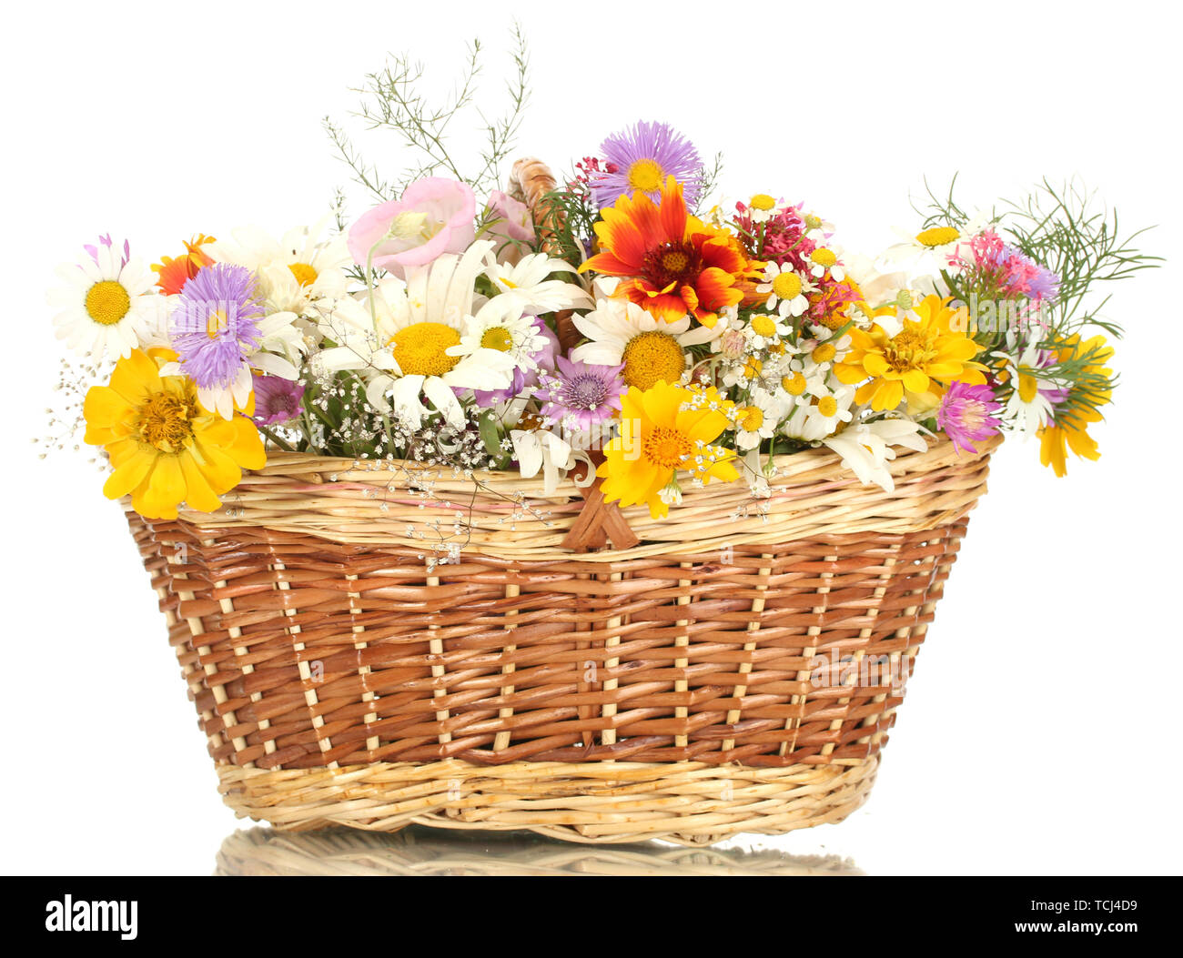 beautiful bouquet of bright wildflowers in basket, isolated on white ...