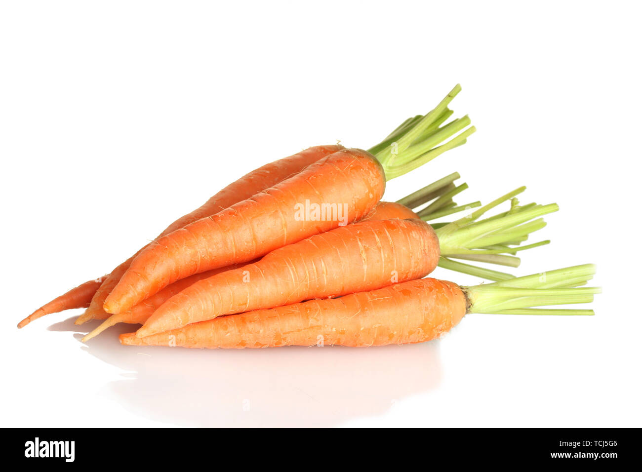 fresh carrots isolated on white Stock Photo - Alamy