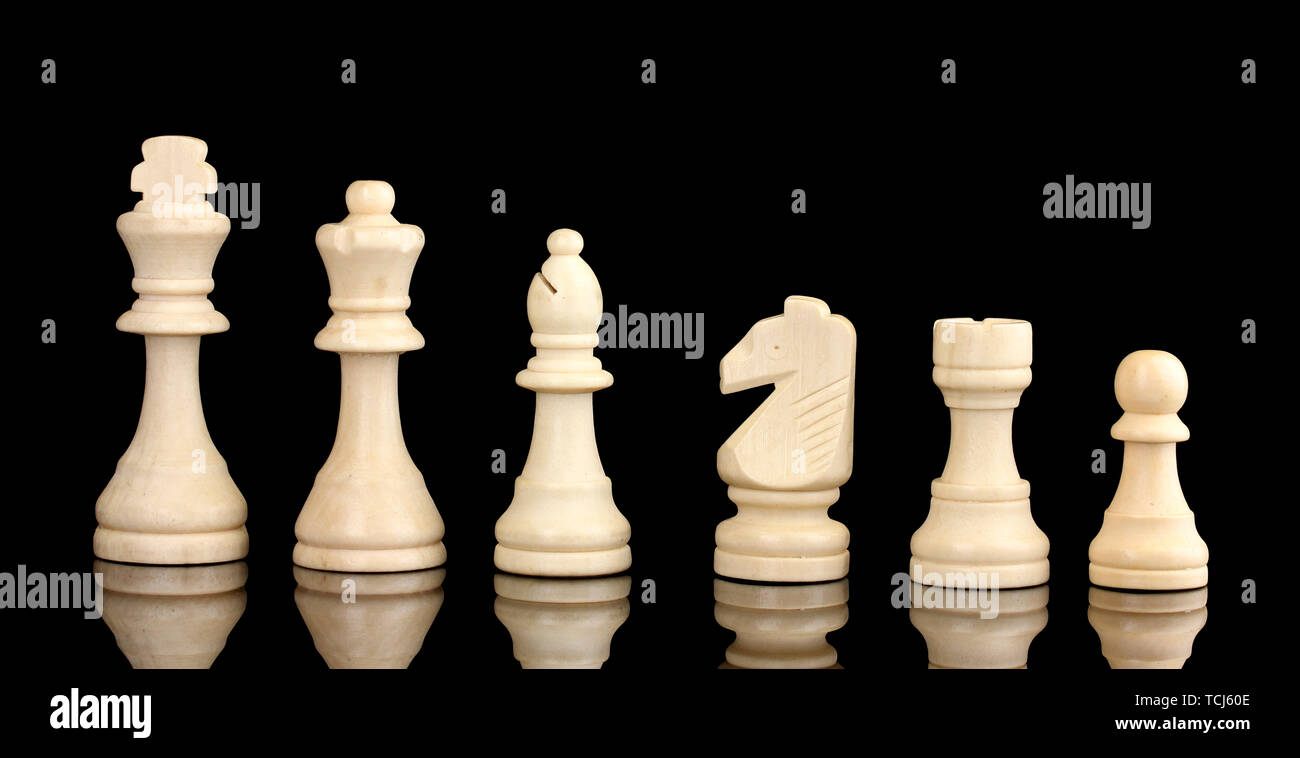Chess pieces isolated on black Stock Photo - Alamy