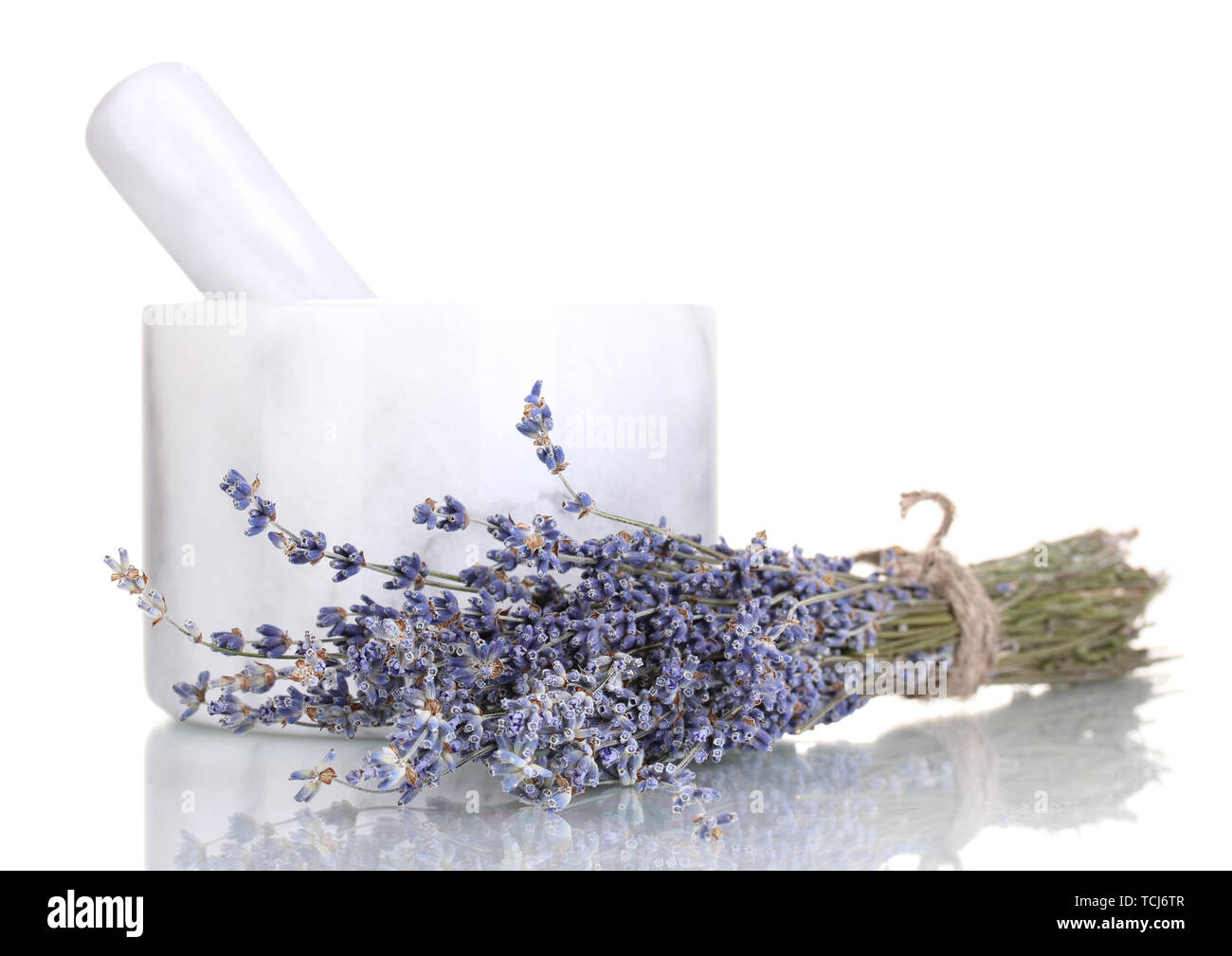 Lavender flowers with mortar isolated on white Stock Photo - Alamy