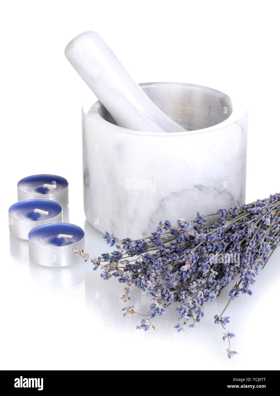Lavender flowers with mortar and candles isolated on white Stock Photo - Alamy