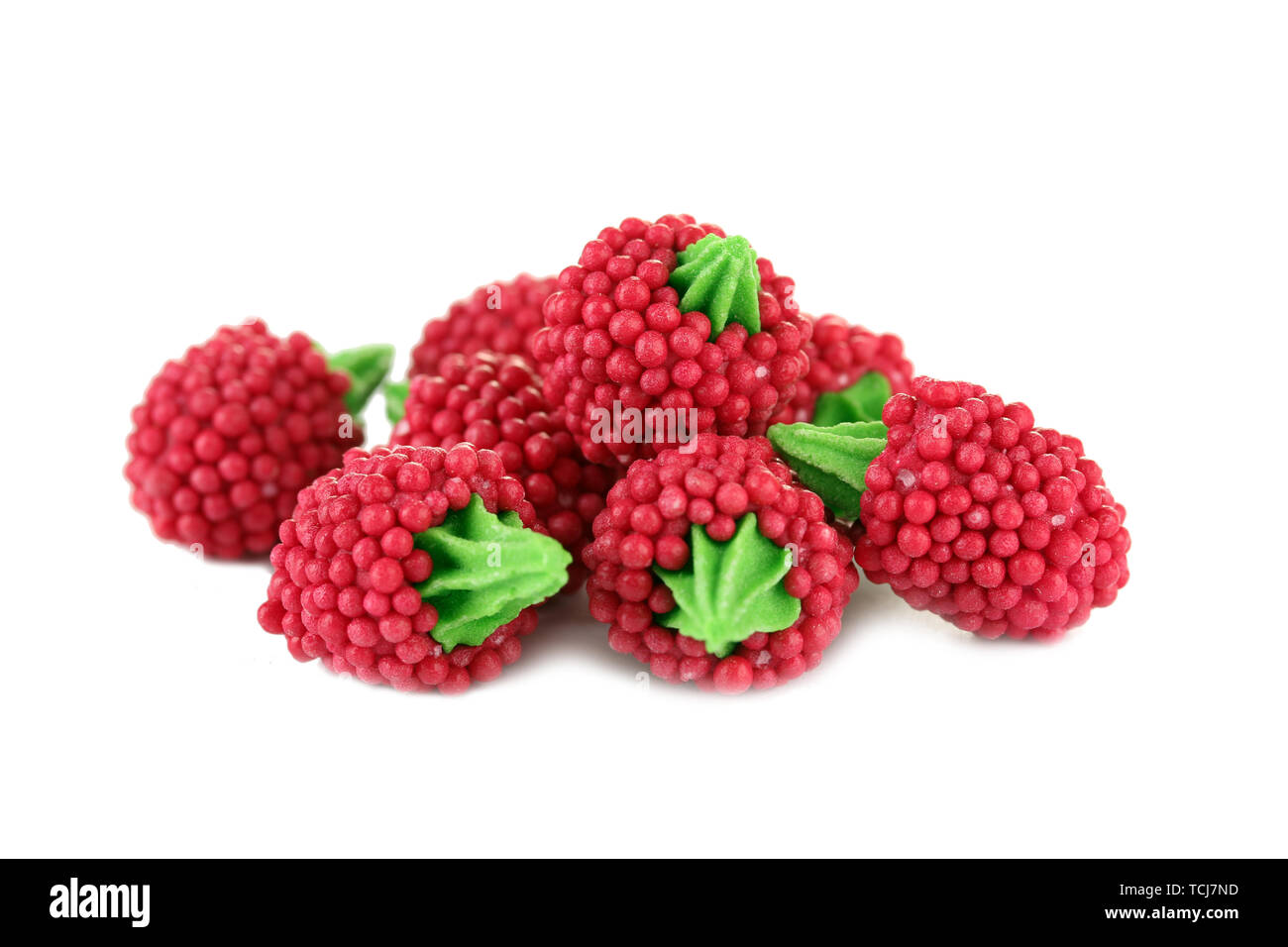 red candy raspberries isolated on white Stock Photo - Alamy