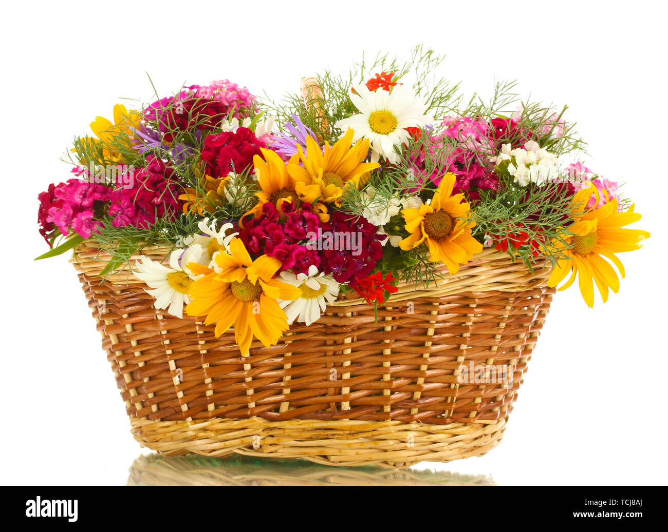 beautiful bouquet of bright wildflowers in basket, isolated on white ...