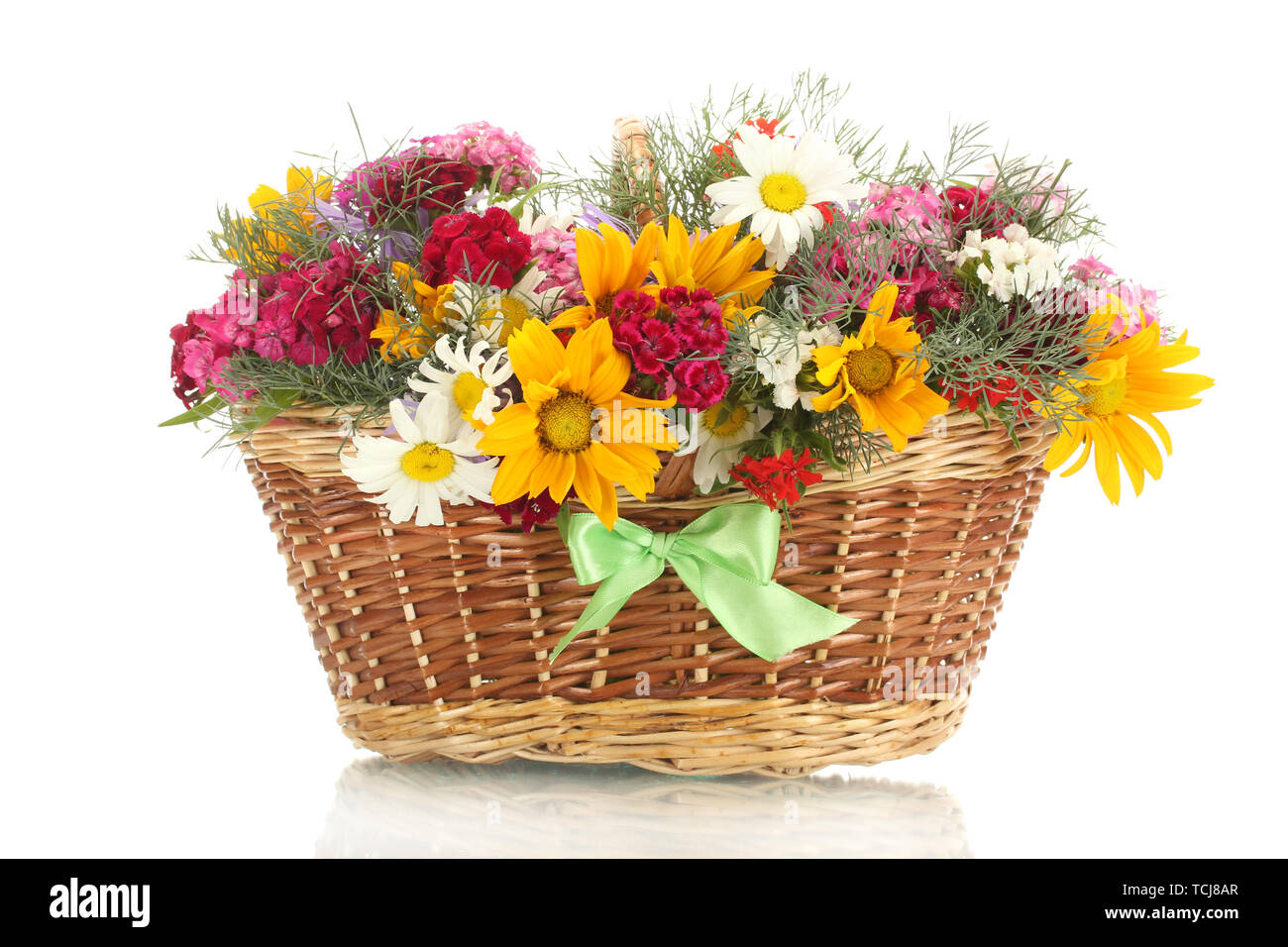 beautiful bouquet of bright wildflowers in basket, isolated on white ...
