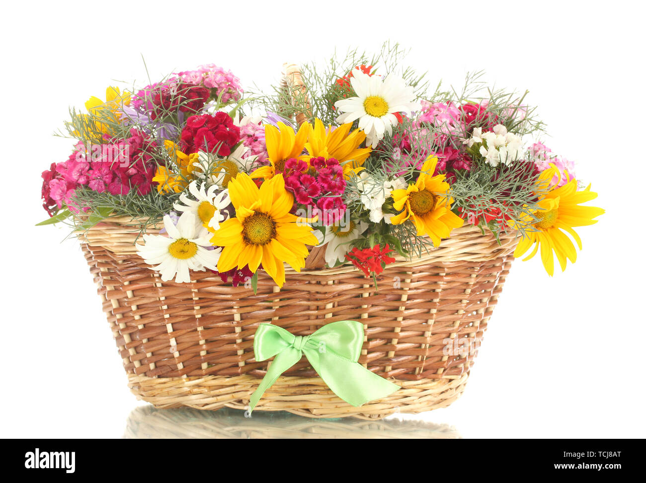 beautiful bouquet of bright wildflowers in basket, isolated on white ...