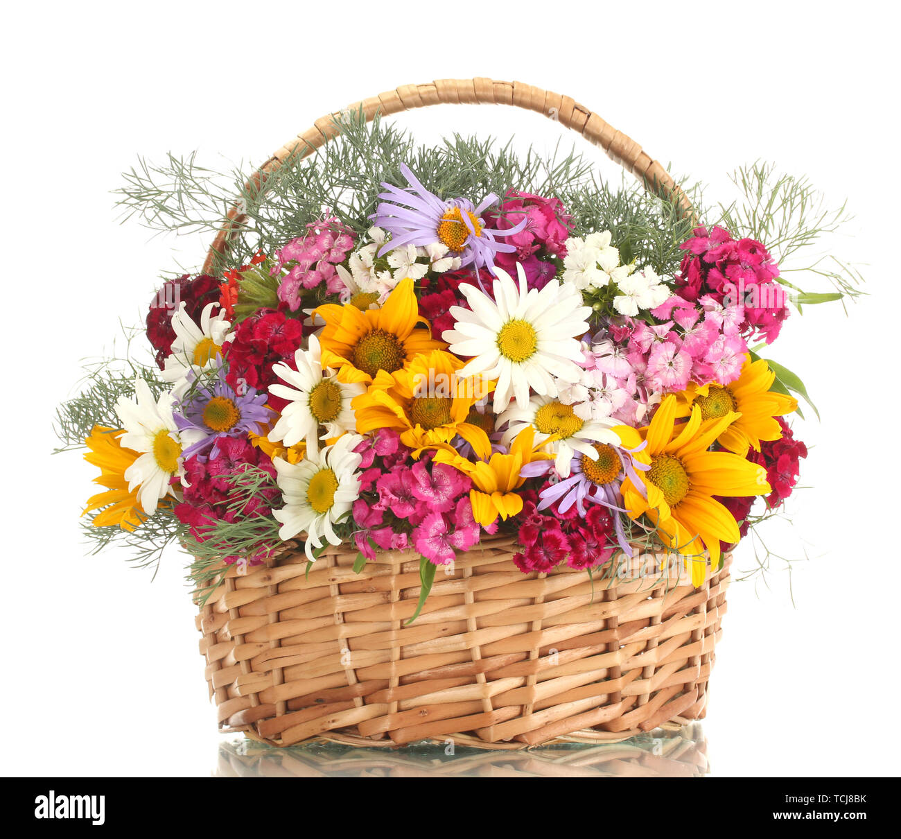 beautiful bouquet of bright wildflowers in basket, isolated on white ...