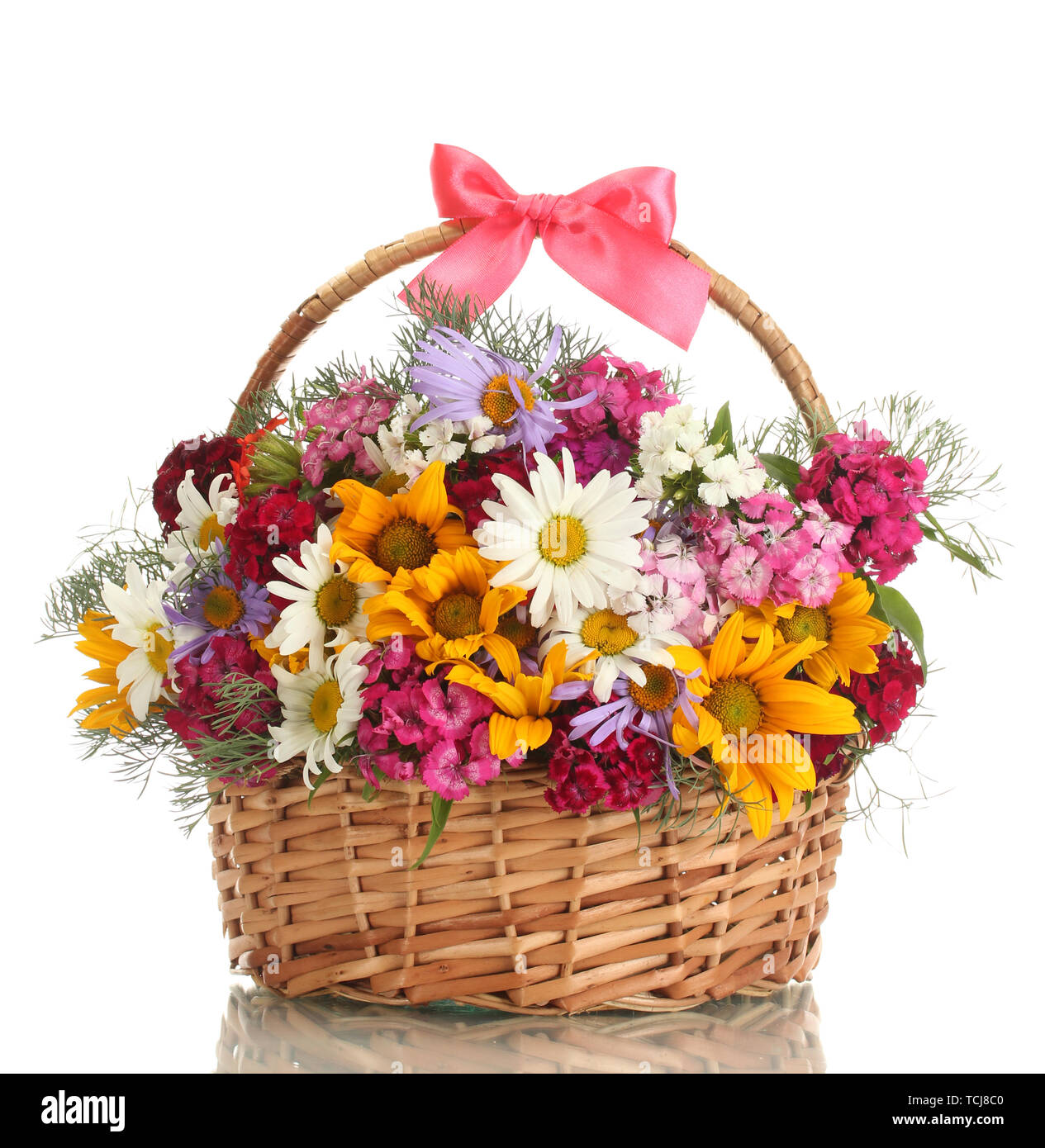 beautiful bouquet of bright wildflowers in basket, isolated on white ...