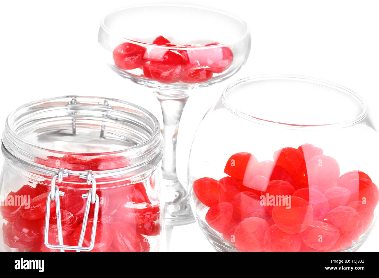 Color candies in glasses isolated on white Stock Photo - Alamy