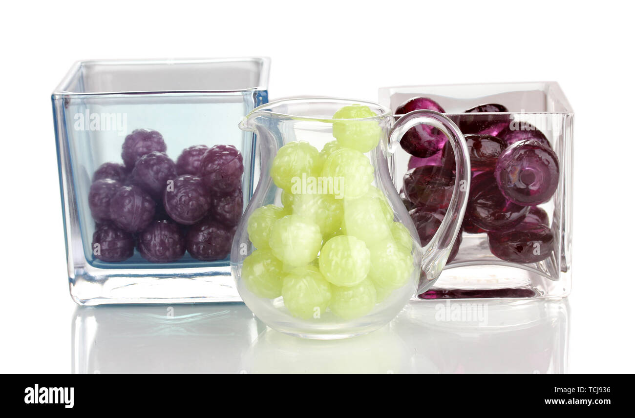 Color candies in glasses isolated on white Stock Photo - Alamy