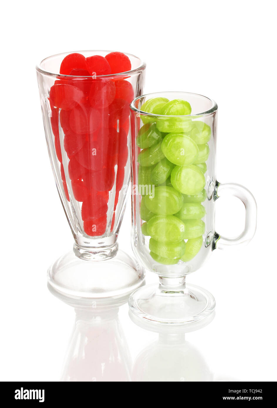 Color candies in glasses isolated on white Stock Photo - Alamy