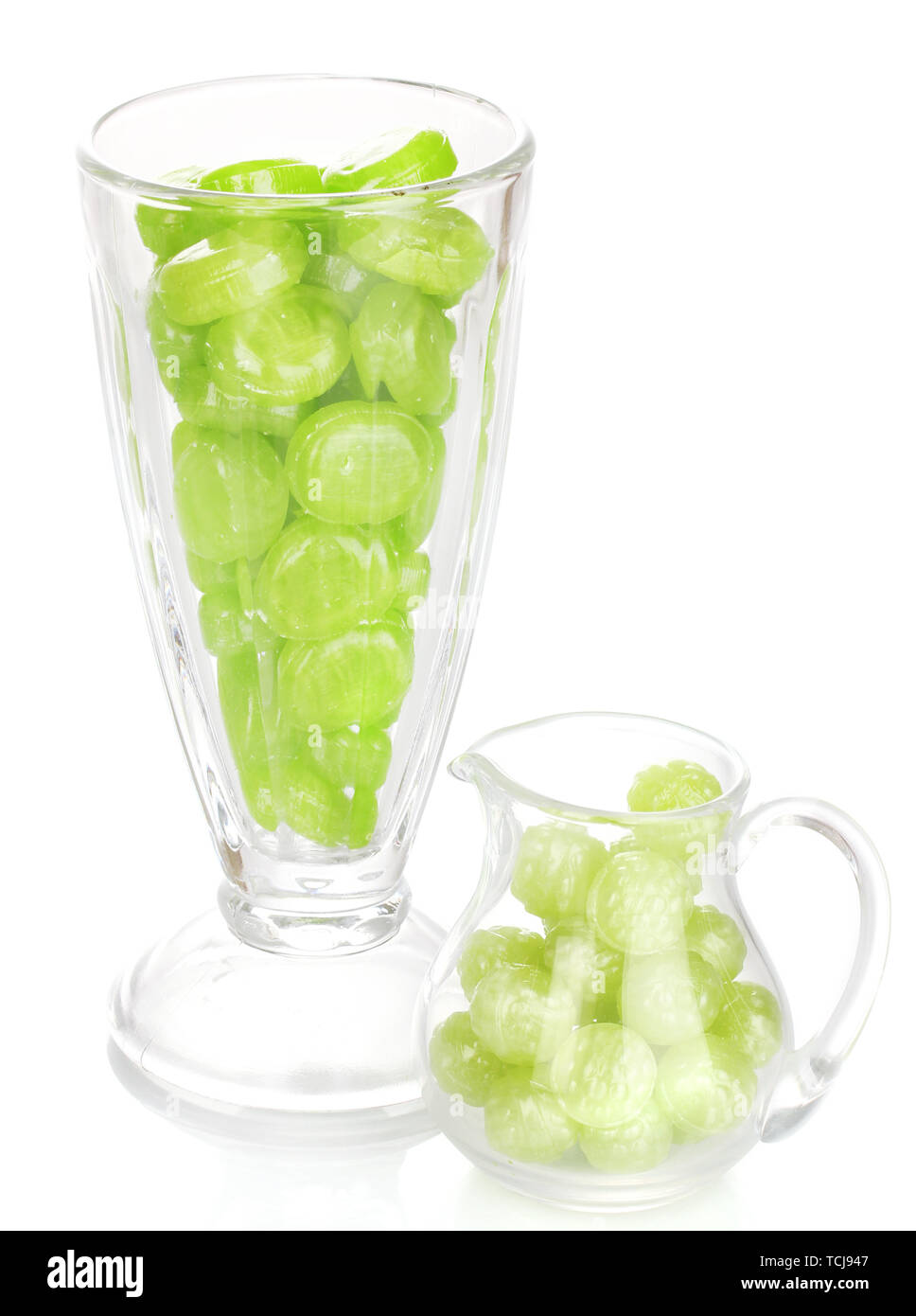 Color candies in glasses isolated on white Stock Photo - Alamy