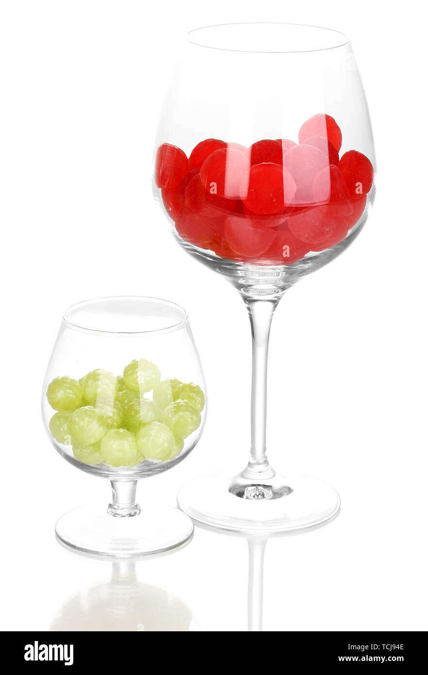 Color candies in glasses isolated on white Stock Photo - Alamy