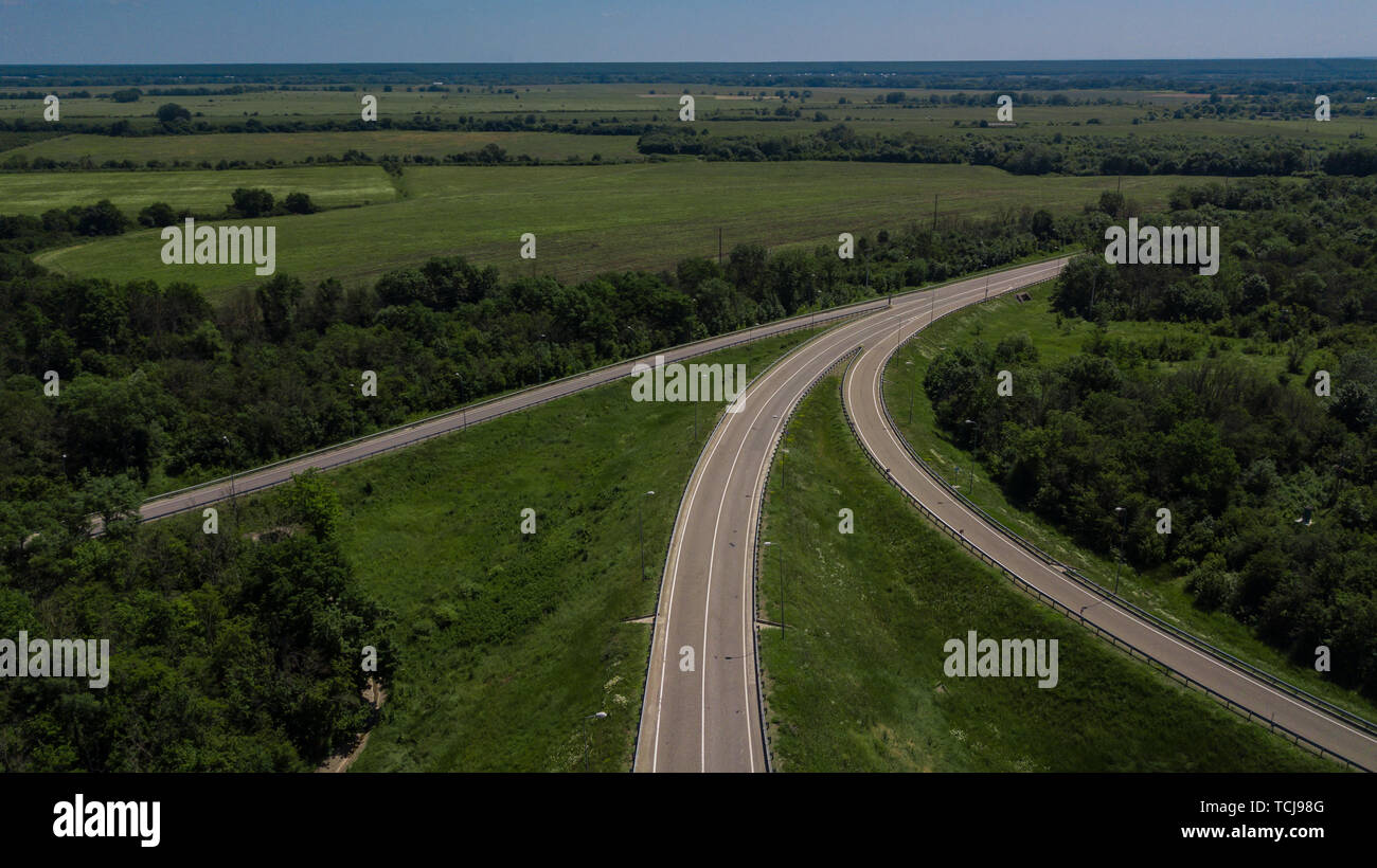 Aerial view of 3 highway road connected in 1 interchange seen from ...