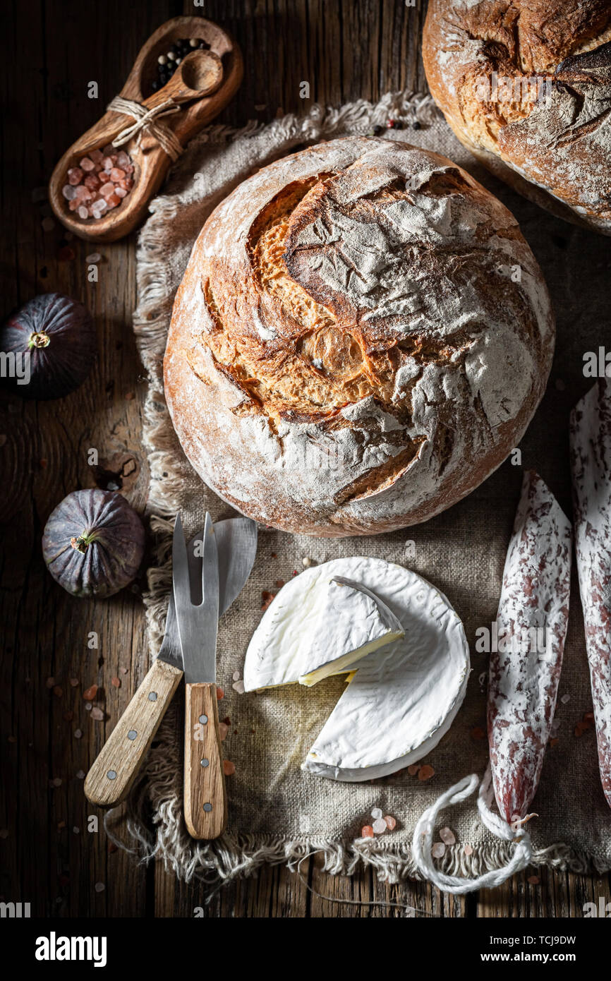 Load of bread with camembert cheese and sausage Stock Photo - Alamy