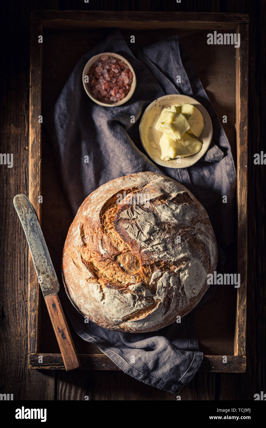 Fresh load of bread with salt and butter Stock Photo - Alamy