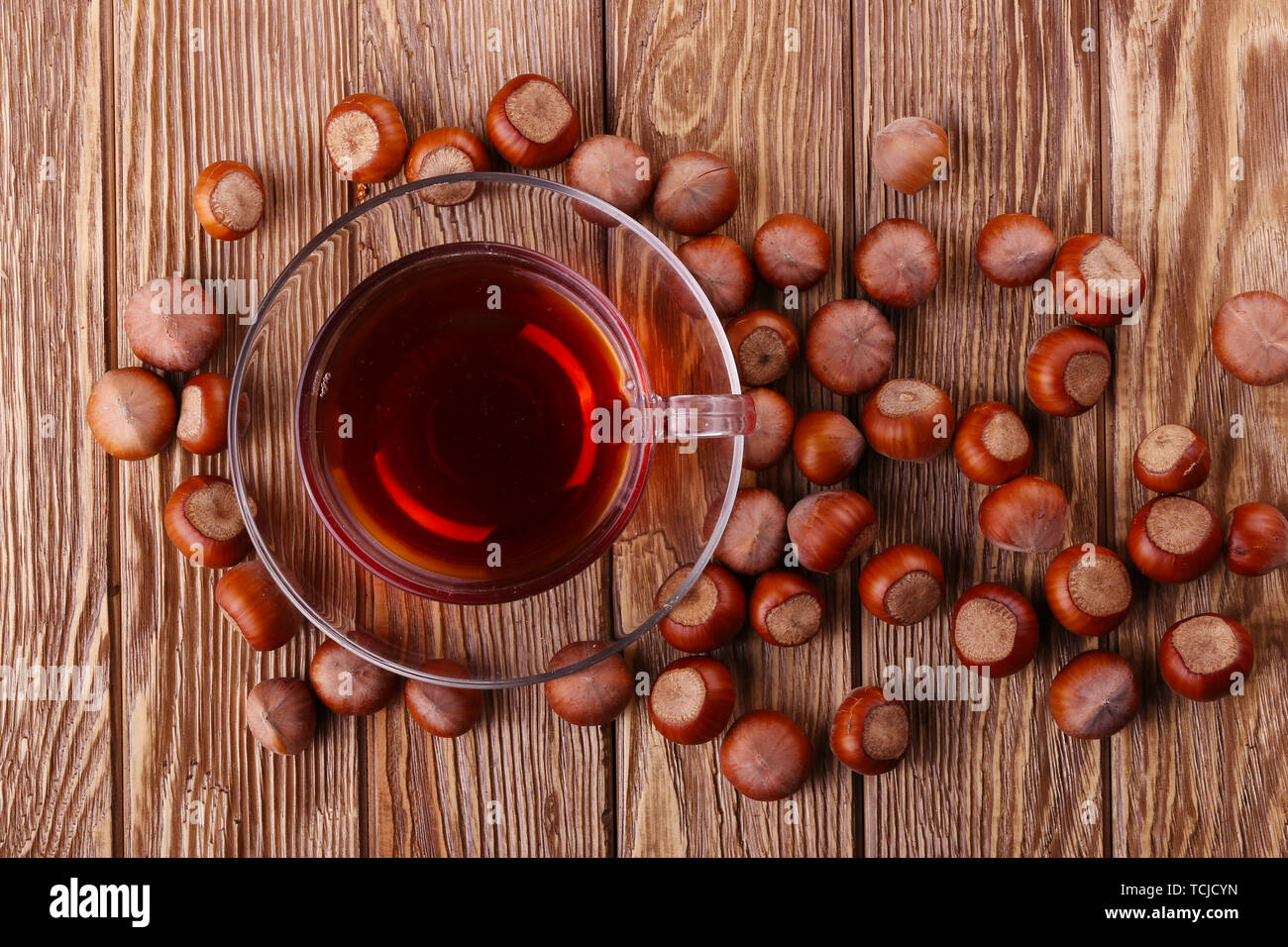 Autumn harvest. nuts on a dark recycled wood background, with copy ...