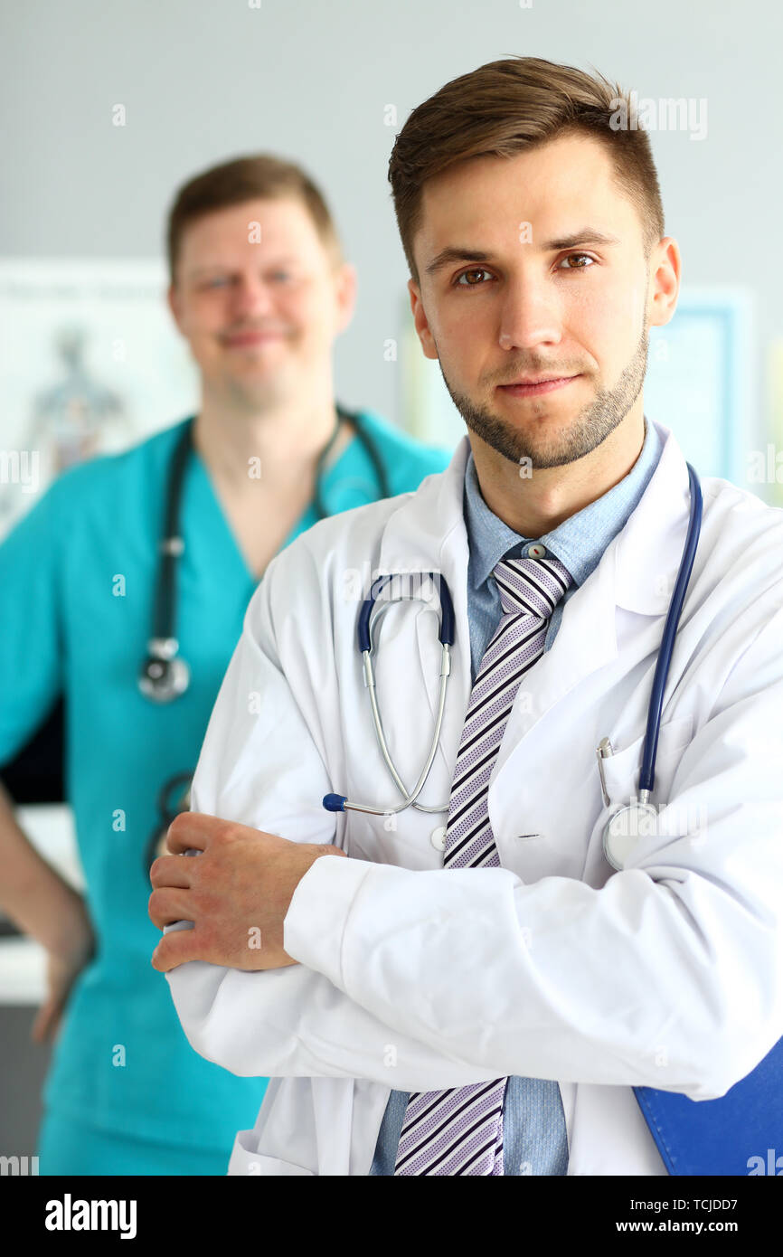 Arms crossed portrait posing uniform hi-res stock photography and ...