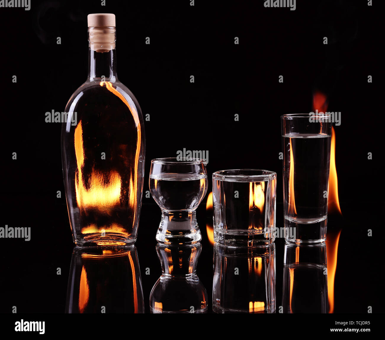 Stack of tequila on fire Stock Photo - Alamy