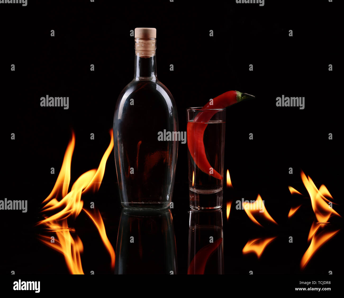 Stack of tequila on fire Stock Photo - Alamy