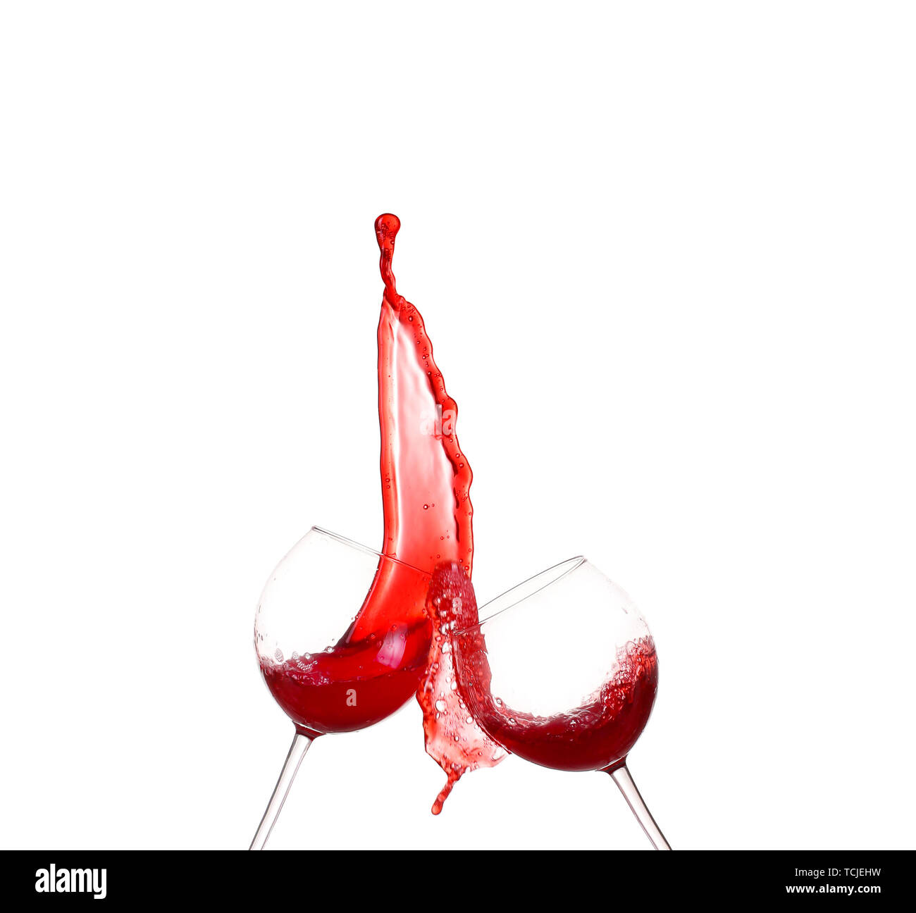 Red wine splashing from glass, isolated on white background Stock Photo ...