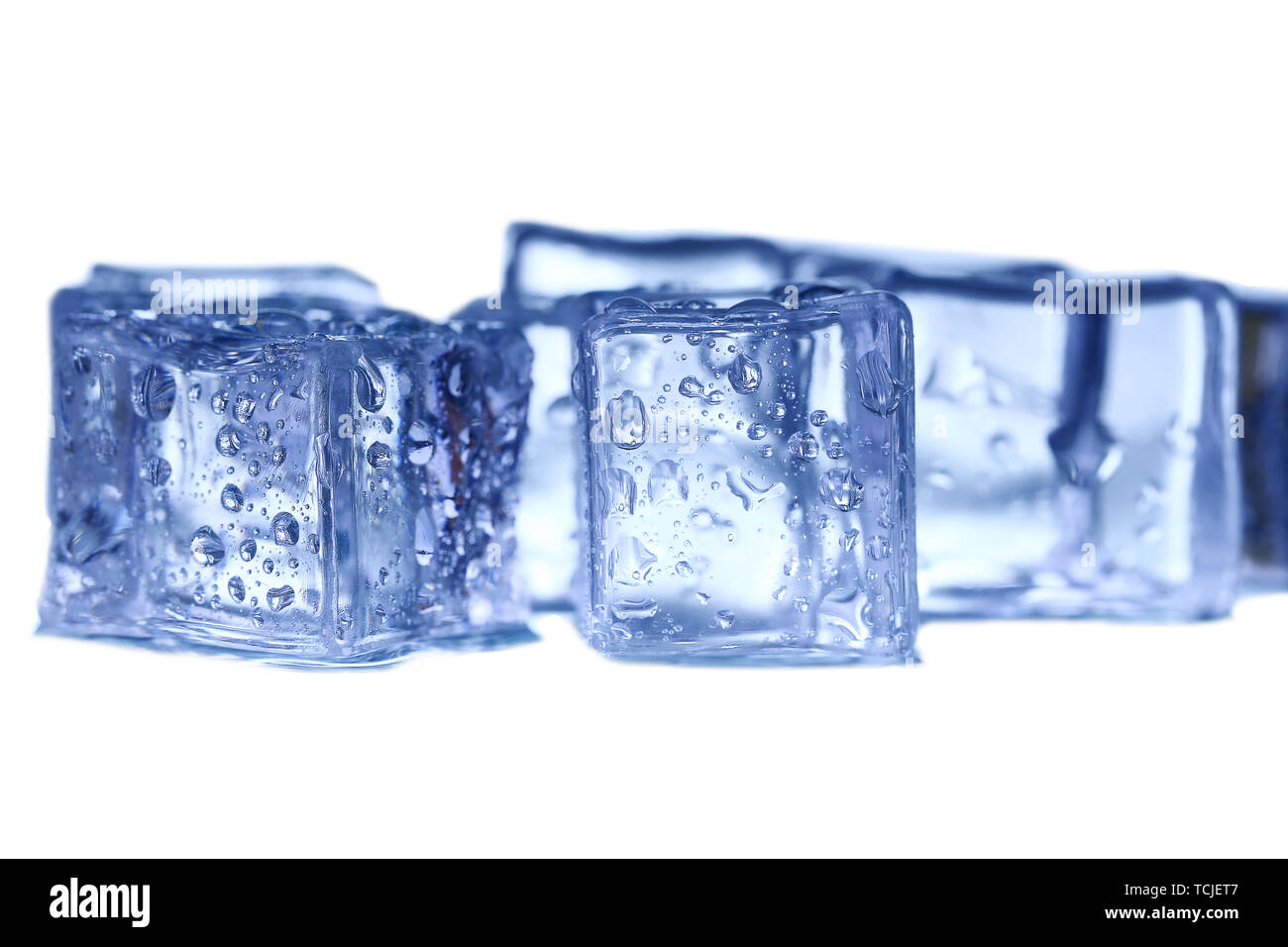 Ice cubes on white background Stock Photo - Alamy