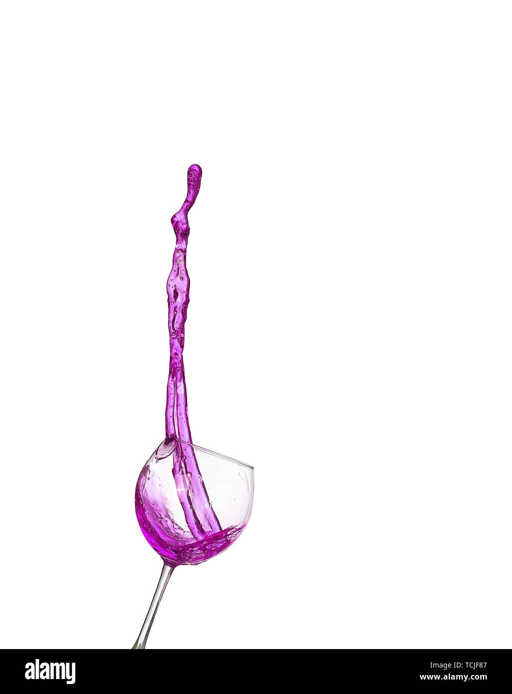 Purple alcoholic cocktail on white isolate splash Stock Photo - Alamy