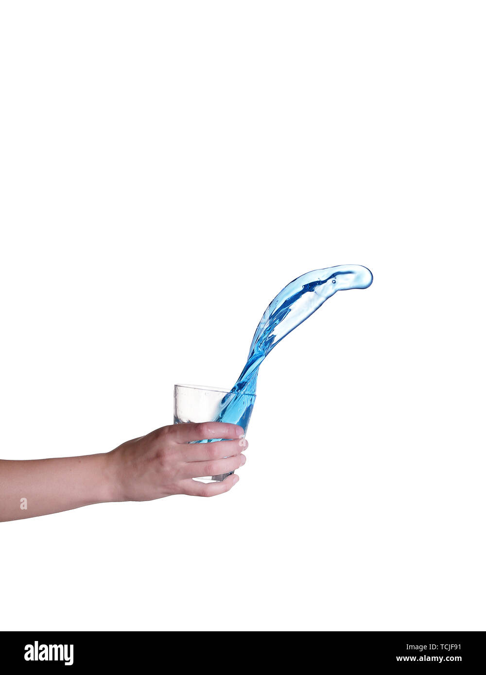 Blue water splashing in glass held by hand, white background Stock ...