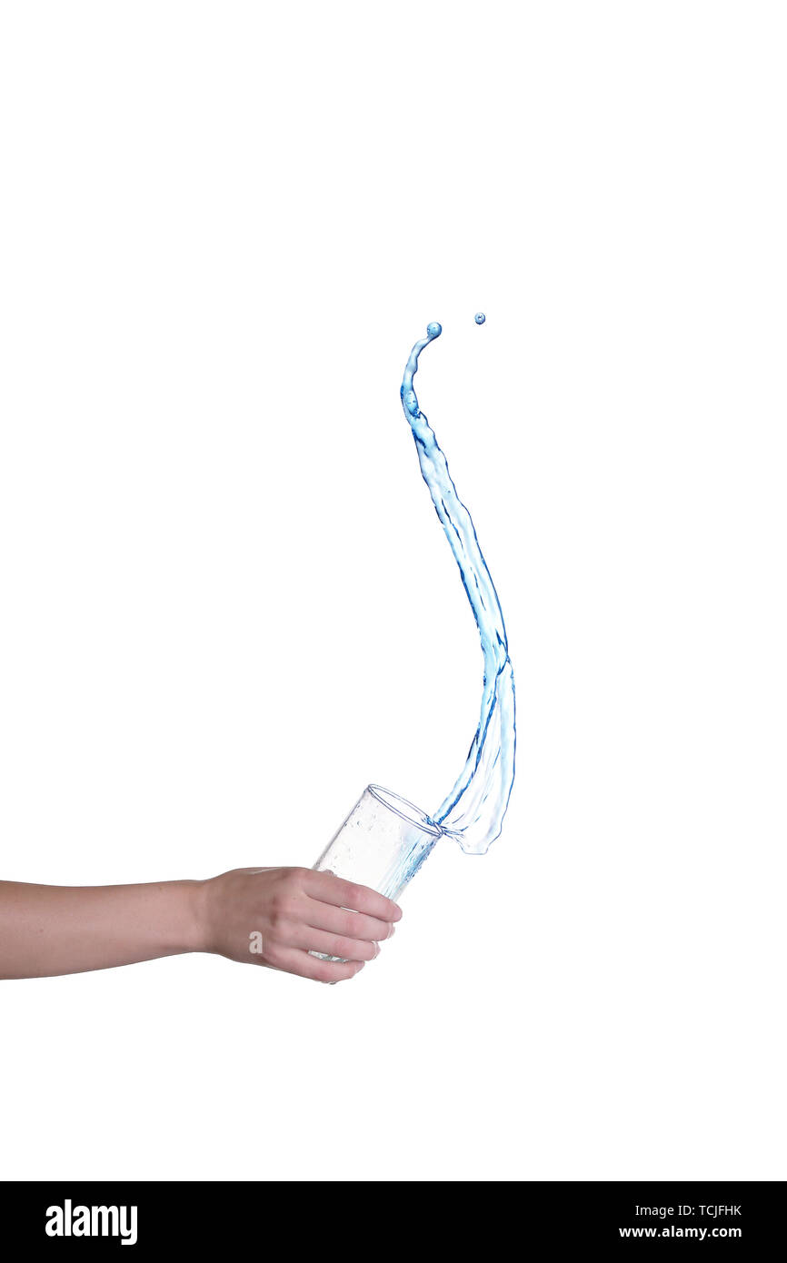 Blue water splashing in glass held by hand, white background Stock ...