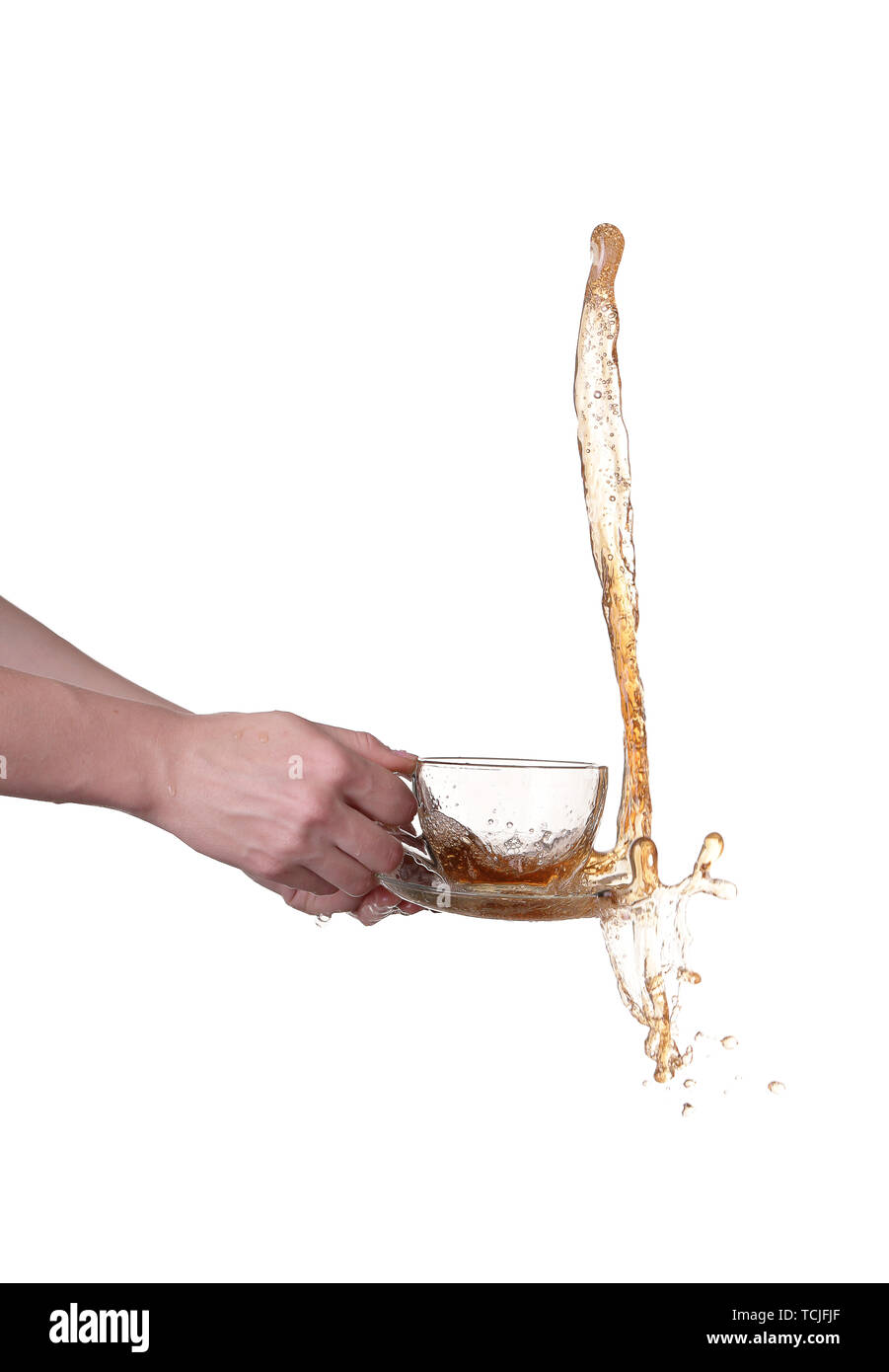 Glass cup of tea with splash Stock Photo - Alamy