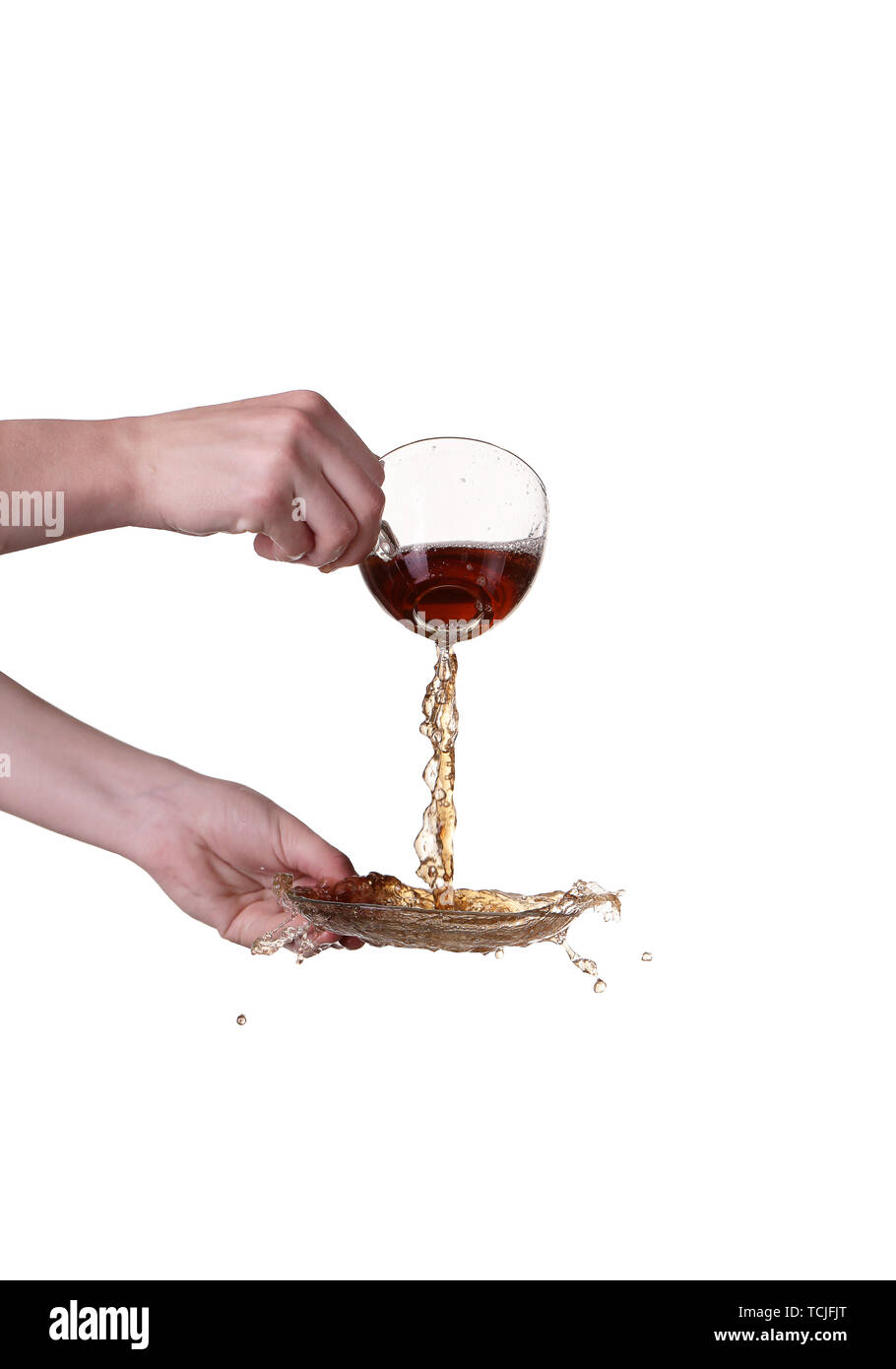 Glass cup of tea with splash Stock Photo - Alamy