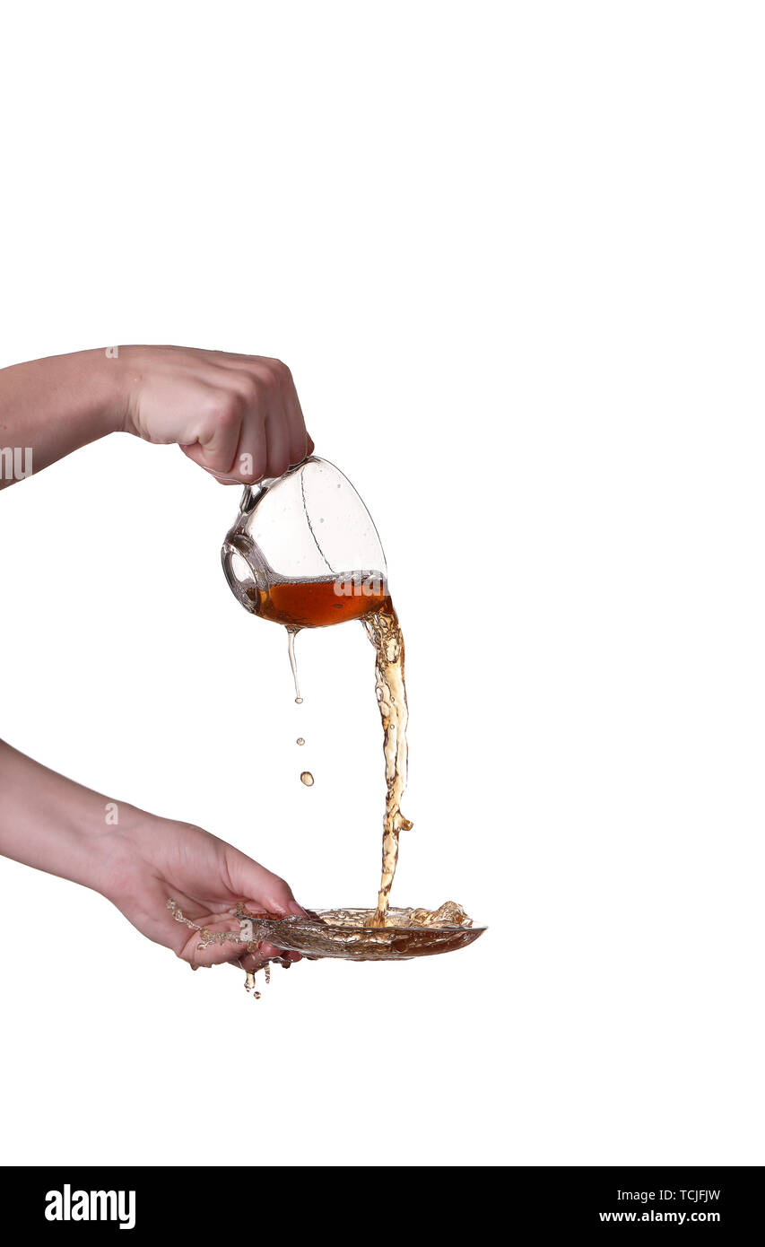 Glass cup of tea with splash Stock Photo - Alamy