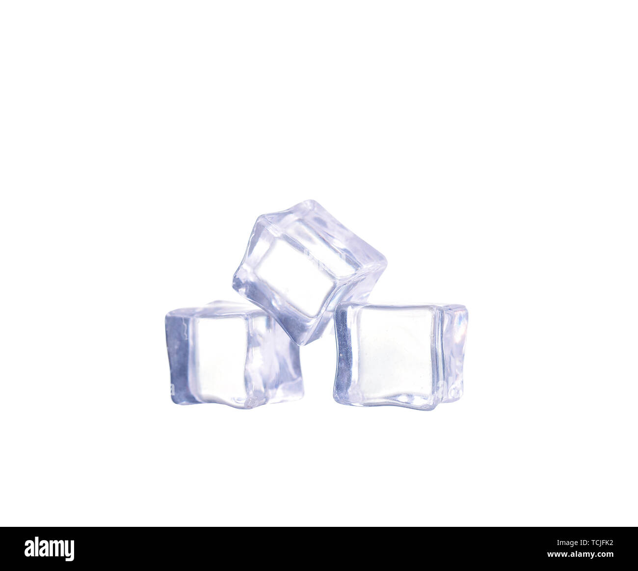 Three ice cubes on white background Stock Photo - Alamy