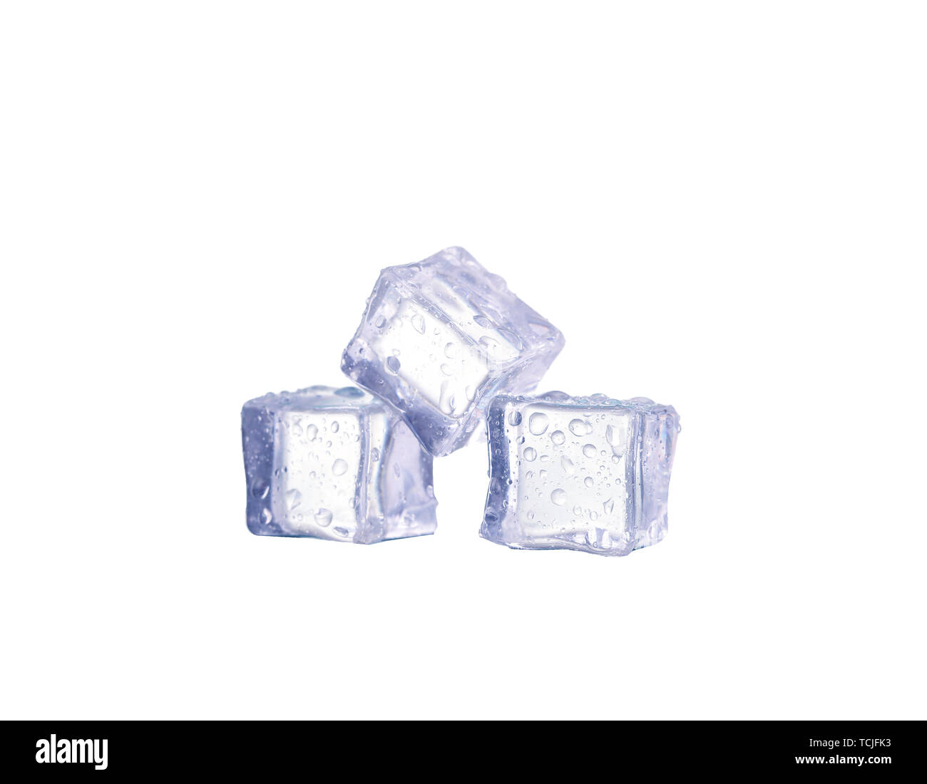 Three ice cubes on white background Stock Photo - Alamy