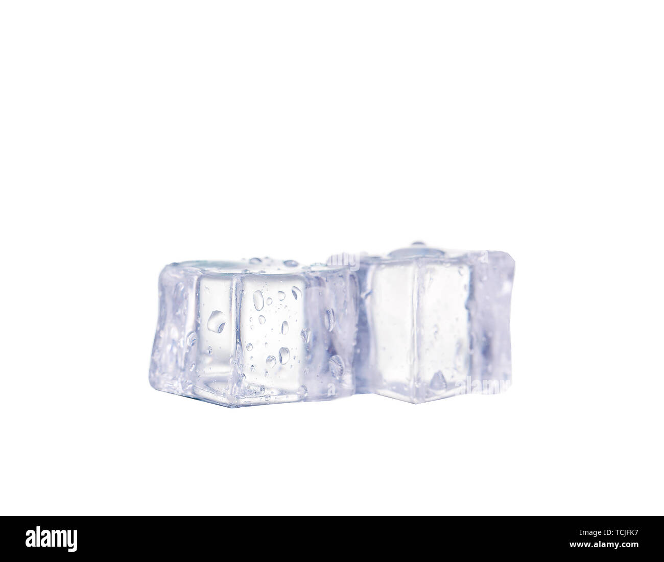 Three ice cubes on white background Stock Photo - Alamy