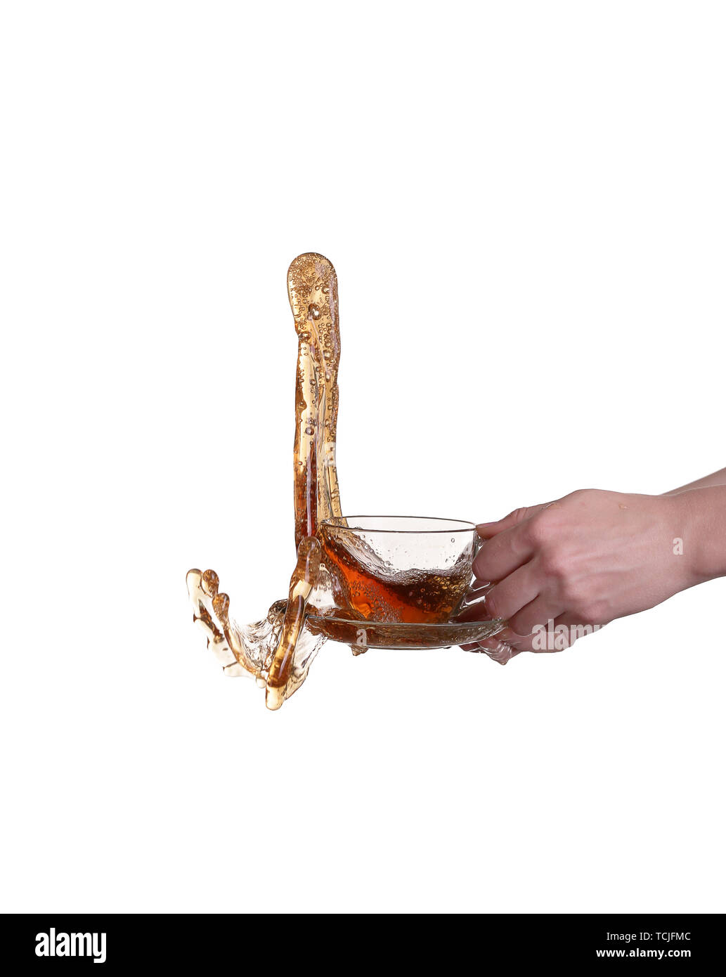 Glass cup of tea with splash Stock Photo - Alamy