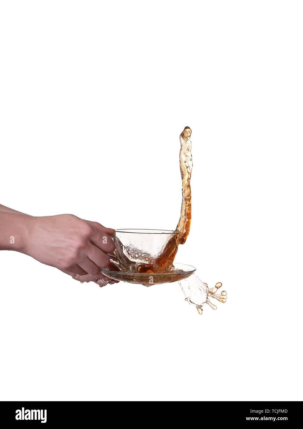 Glass cup of tea with splash Stock Photo - Alamy