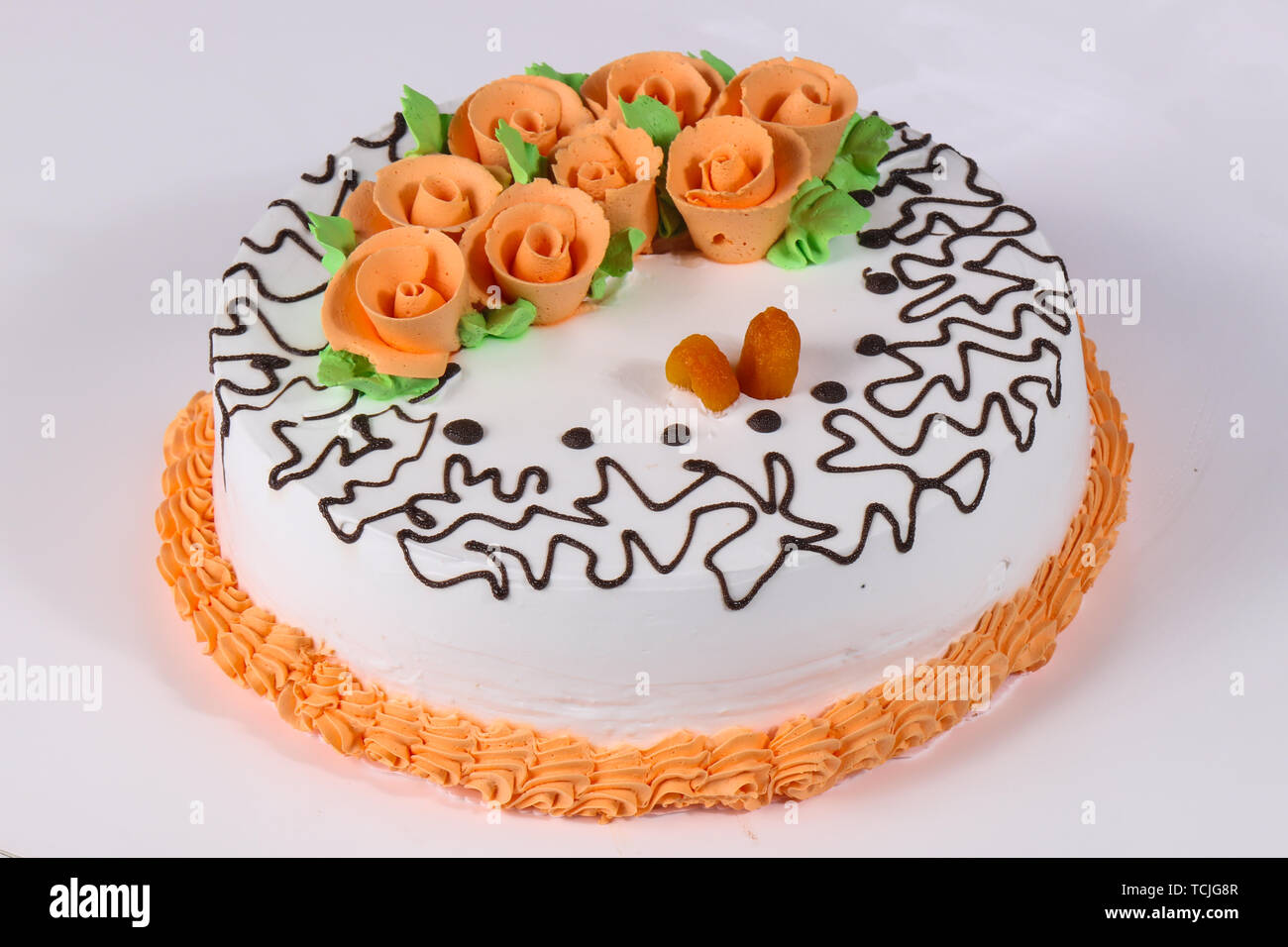 Tasty Cake with cream flowers Stock Photo - Alamy