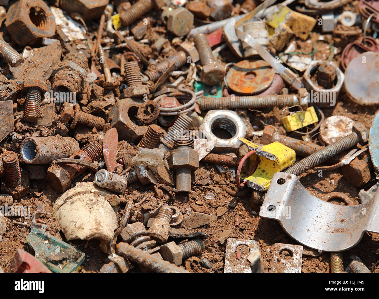 junk and old things in the dump of an old iron with many rusted broken ...